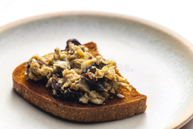 Roasted Bread Served with Scrambled Eggs and Mushrooms Stock Photo ...