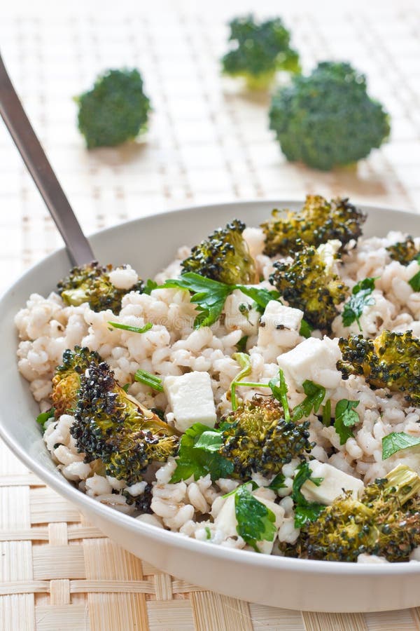 Roasted Broccoli and Farro Salad with Feta Stock Photo - Image of meal ...