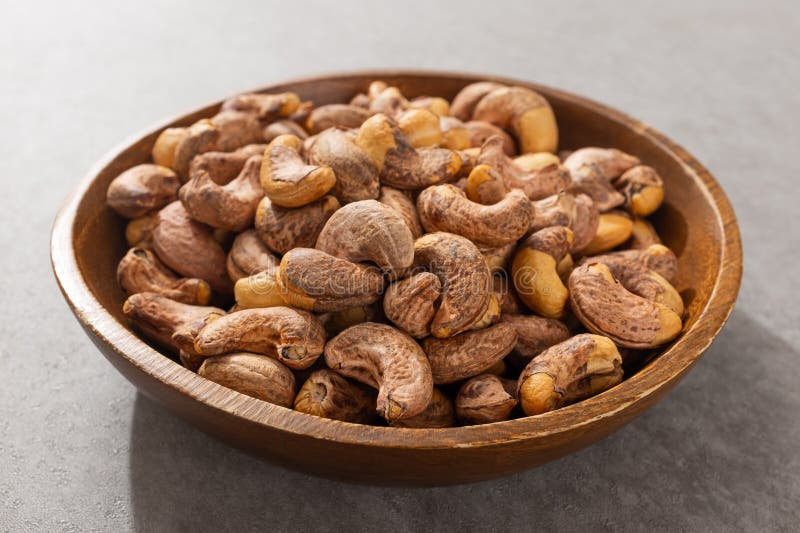 Roasted Cashew Nuts with Shells Stock Photo - Image of food, stirfried ...