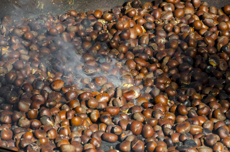 Roasted Chestnuts Cooked on the Grill Stock Photo - Image of heat ...