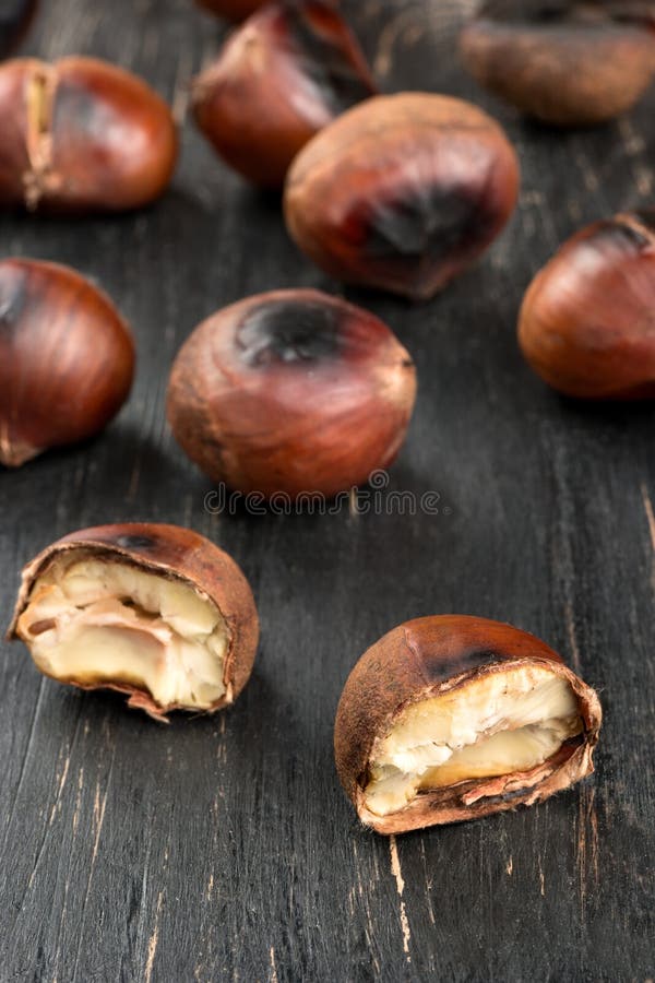 Roasted chestnuts and half stock image. Image of chestnut - 85783729