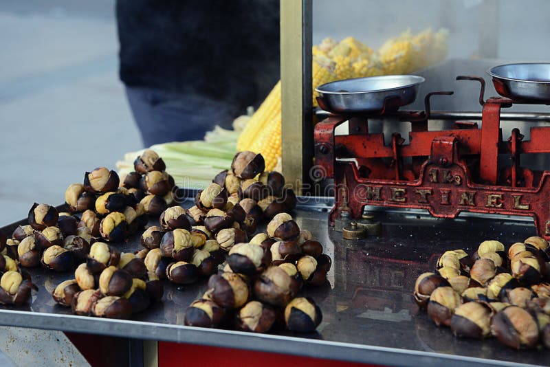 Roasted chestnuts editorial photography. Image of food - 141196587
