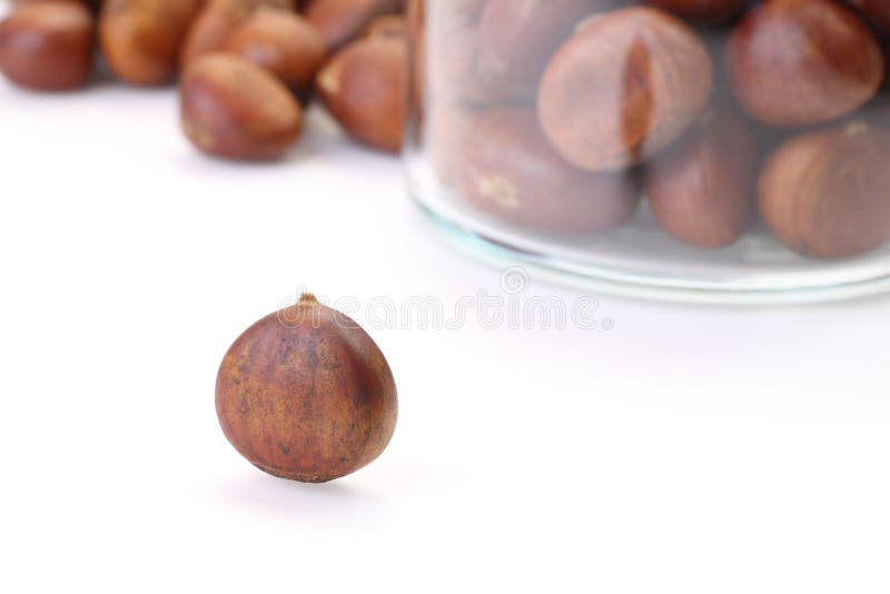 Roasted Chestnuts Outside Bottle Stock Photo - Image of plant, white ...