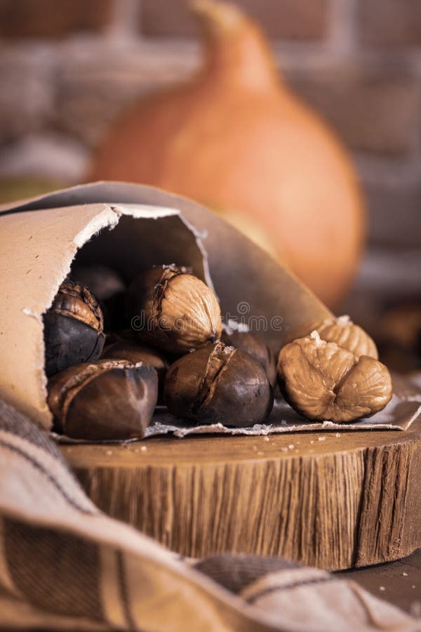Roasted Chestnuts in a Paper Cone Stock Image - Image of chestnuts ...
