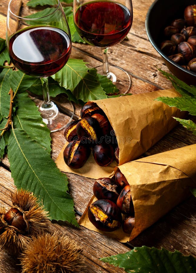 Roasted Chestnuts in Paper Cones. Stock Photo - Image of nuts, roast ...