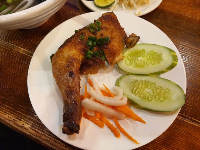 Roasted chicken drumstick stock image. Image of meal - 272163597