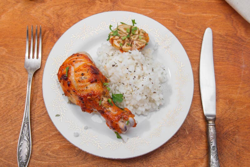 Roasted Chicken Drumstick Garnished with Rice Stock Image - Image of ...