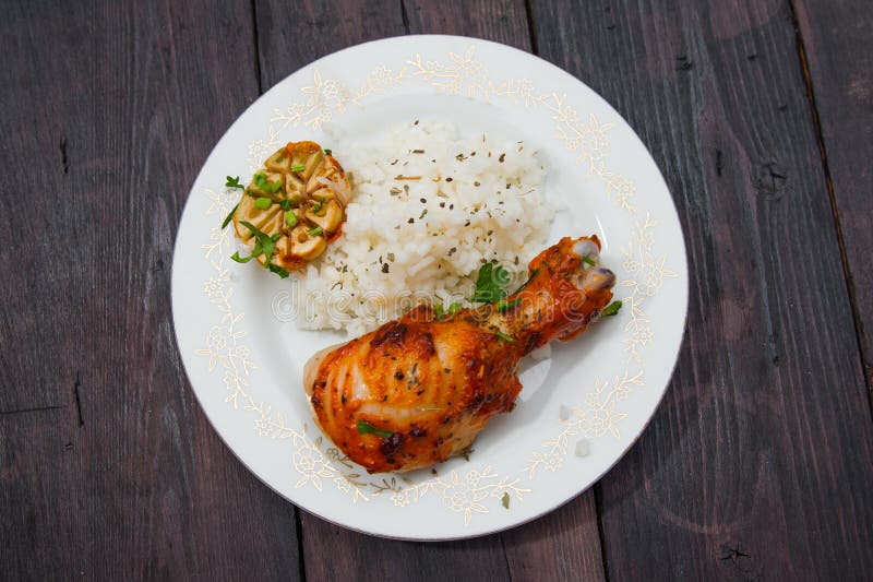 Roasted Chicken Drumstick Garnished with Rice Stock Image - Image of ...