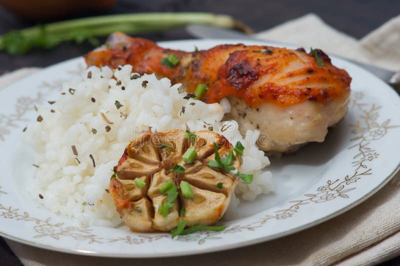 Roasted Chicken Drumstick Garnished with Rice Stock Image - Image of ...