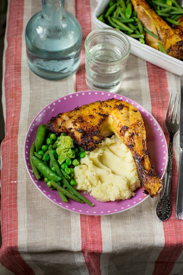 Roasted Chicken Legs with Adjika and Tomato Sauce Stock Photo - Image ...