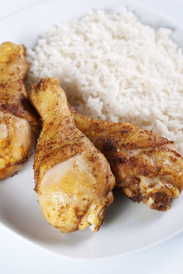 Roasted Chicken Legs with Boiled Rice Stock Photo - Image of baked ...