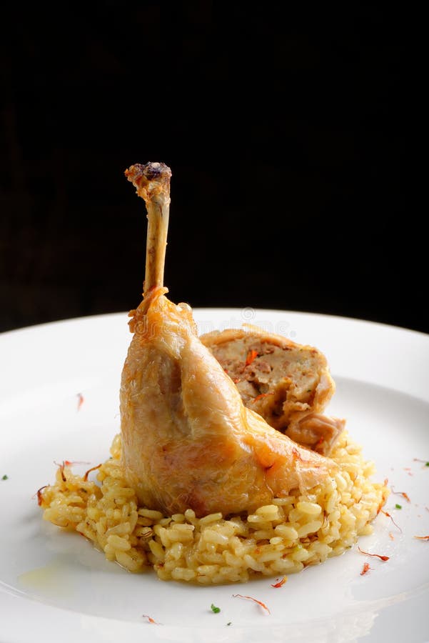 Roasted Chicken Legs with Cooked Saffron Rice Stock Image - Image of ...