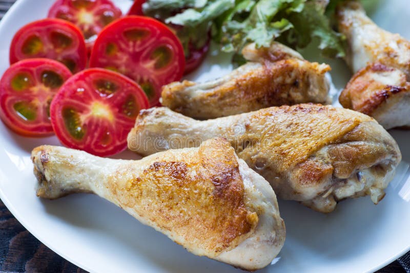 Roasted Chicken Legs with Rosemary and Tomato Stock Image - Image of ...