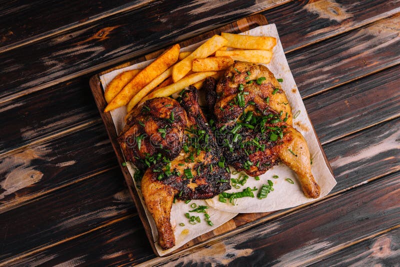 Roasted Chicken Piri Piri with French Fries Stock Image - Image of ...