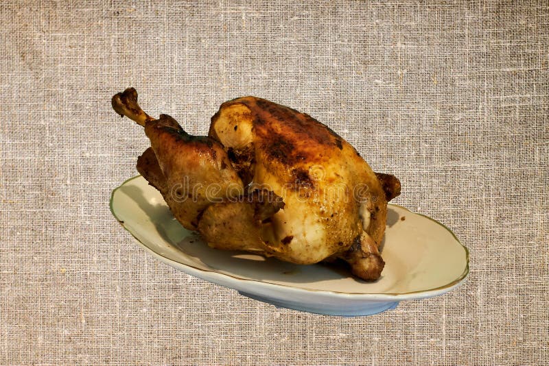 Roasted chicken on a plate stock photo. Image of turkey - 196622070