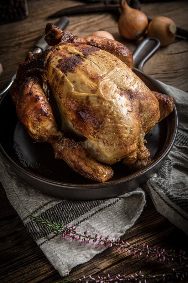 Roasted chicken on plate stock image. Image of baked - 275363939