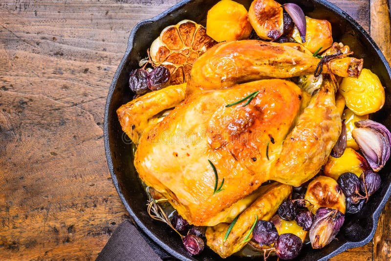 Roasted Chicken with Potatoes. Stock Photo - Image of baked, garlic ...