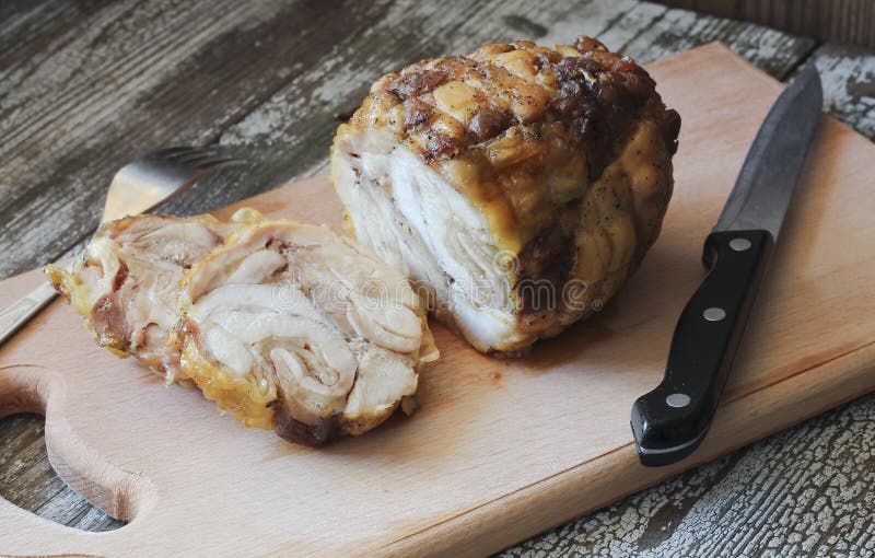 Roasted Chicken Roll on a Cutting Board Stock Photo - Image of ...