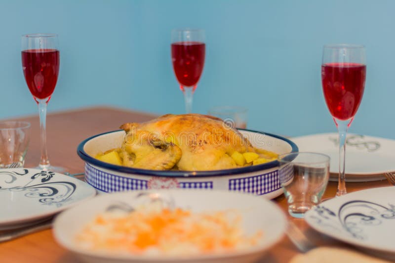 Roasted chicken on table stock photo. Image of dining - 89928240