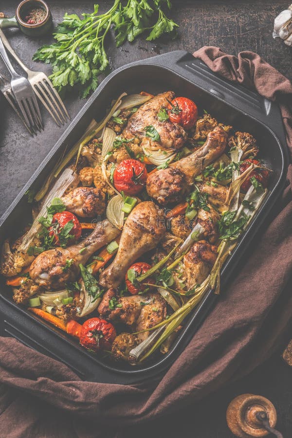 Roasted Chicken and Vegetables in Black Grill Frying Pan on Rustic ...