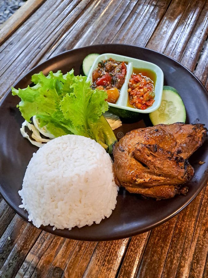 Roasted Chicken With White Rice On A Chocolate Plate Stock Image Image Of Restaurant Salad