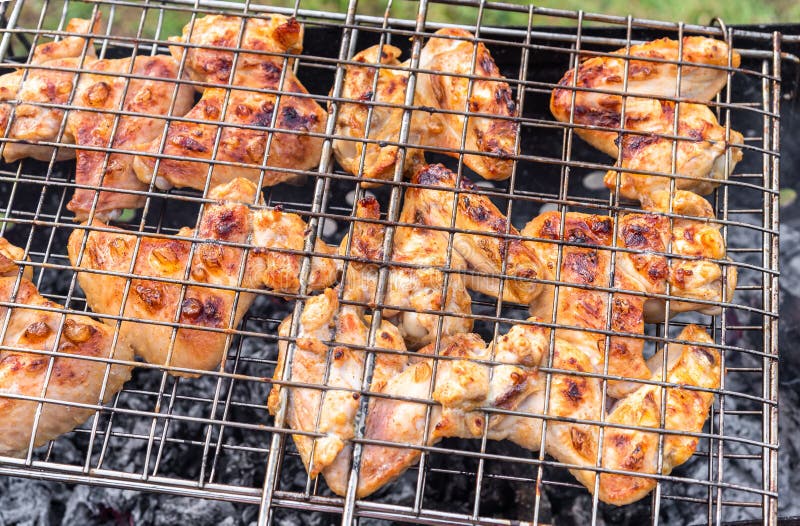 Roasted Chicken Wings on the Charcoal Grill Stove Stock Photo - Image ...