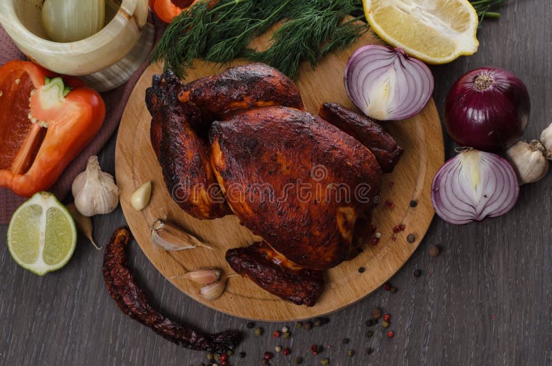 Roasted Chicken on Wooden Background Stock Photo - Image of crispy ...