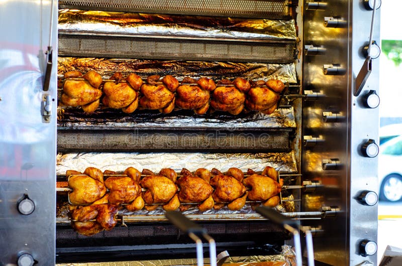 Roasted Chickens on Spit Grilled Over Fire Stock Photo - Image of ...