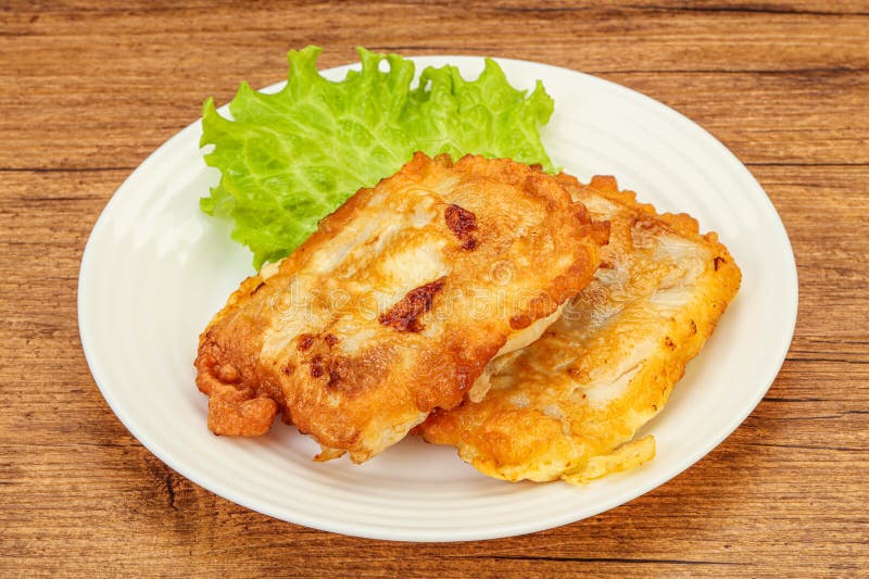 Roasted cod fish in bread stock image. Image of fillet - 187515343