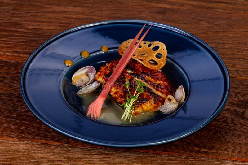 Roasted Cod Fish with Scallops Stock Photo - Image of roast, scallops ...