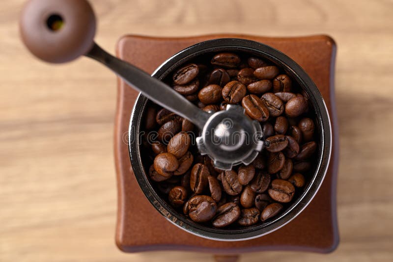 Roasted Coffee Bean (Arabica Coffee) in Vintage Grinder with Handle ...