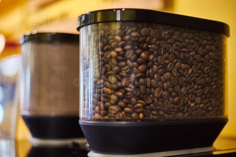 Roasted Coffee Beans in a Plastic Transparent Container of an ...