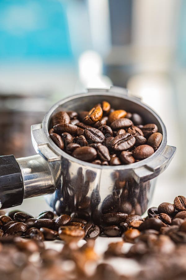 Roasted Coffee Beans in Portafilter on White Kitchen Table Stock Photo ...