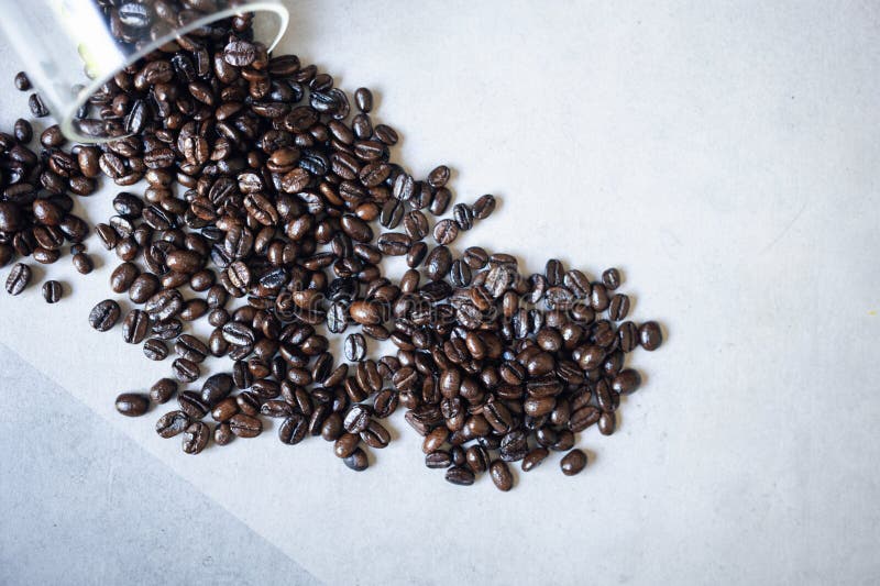 Roasted Coffee Beans Pouring from a Glass Stock Image - Image of ...