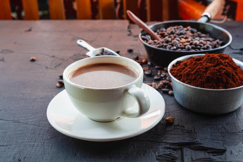 .Roasted Coffee Beans with Coffee Powder and Coffee Cups Stock Image ...