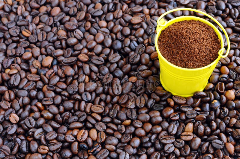 Roasted Coffee Beans and a Small Bucket with Ground Coffee. Stock Image ...
