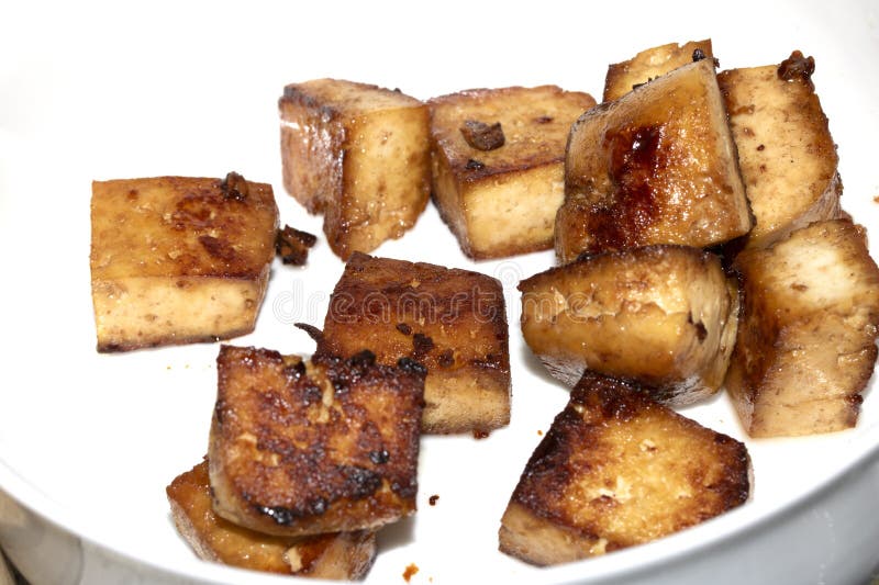 Roasted Cooked Tofu Soya on a White Bowl Stock Photo - Image of plate ...