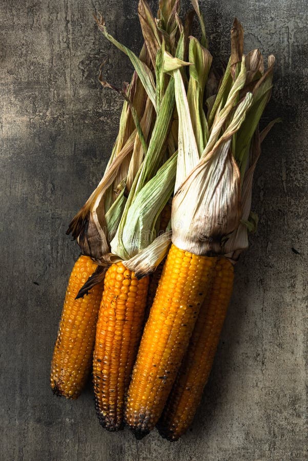 Roasted Corn Cobs on Stone Table, Grilled Organic Food Stock Image ...