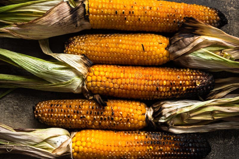Roasted Corn Cobs on Stone Table, Grilled Organic Food Stock Image ...
