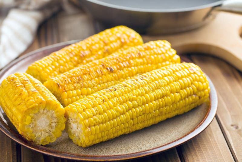 Roasted corn on plate stock photo. Image of corn, rural - 45157544