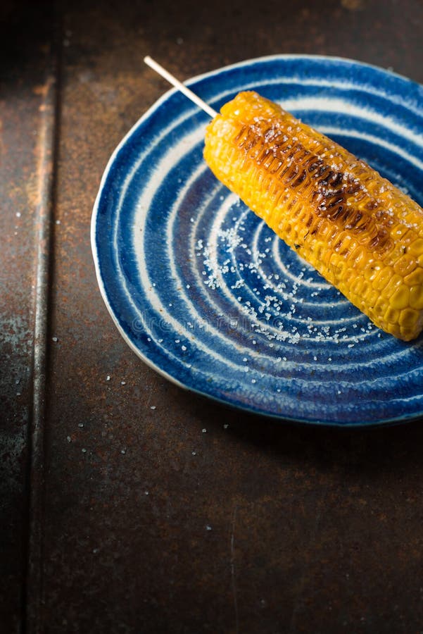 Roasted Corn with Salt on Blue Ceramic Plate Stock Photo - Image of ...