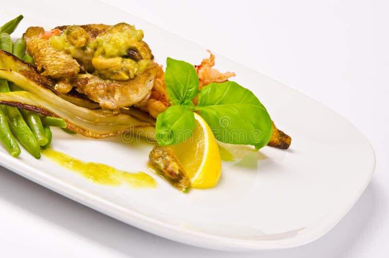 Roasted Dorade with Seafood Stock Photo - Image of cuisine, beans: 22326918