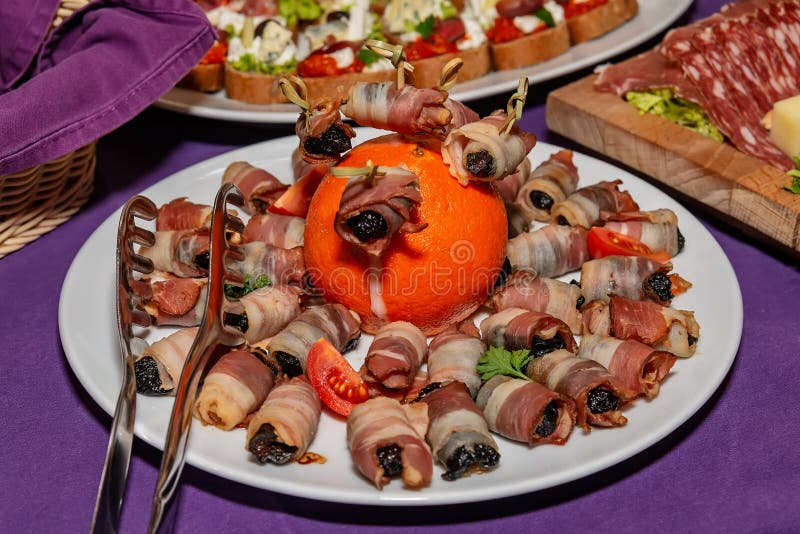 Roasted Dried Plums Wrapped in Bacon Stock Photo - Image of food ...