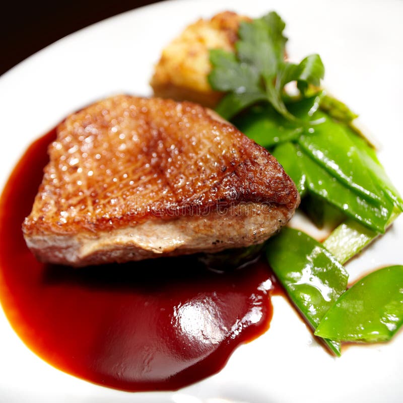 Roasted duck breast fillet stock photo. Image of dining - 6469714