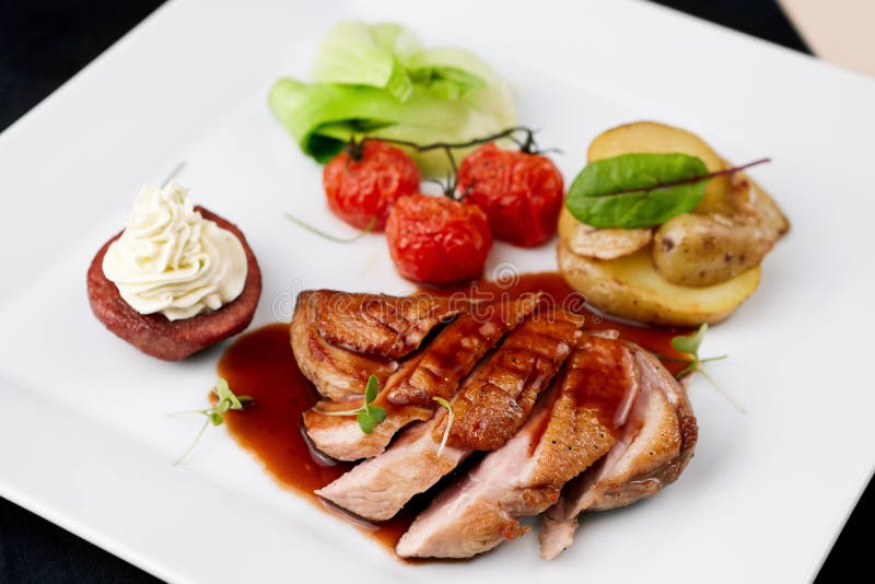 Roasted duck breast fillet stock photo. Image of dining - 6469714