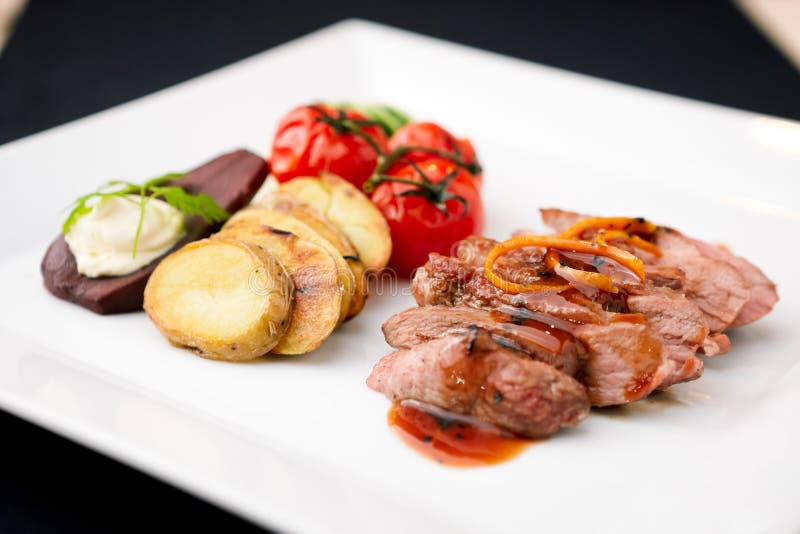 Roasted duck breast fillet stock photo. Image of dining - 6469714