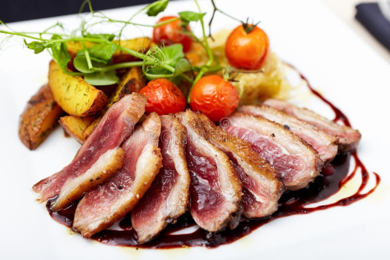 Roasted duck breast fillet stock photo. Image of dining - 6469714