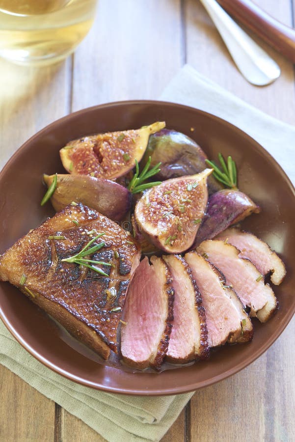 Roasted Duck Breast with Figs and Rosemary Stock Image - Image of ...