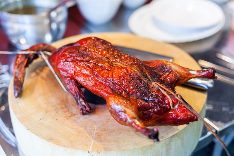 Roasted Duck on the Chopping Block Stock Photo - Image of business ...