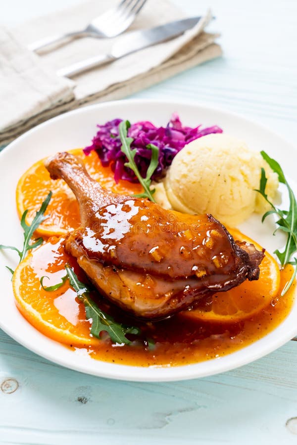 Duck Leg Steak with Orange Sauce Stock Photo - Image of orange, lunch ...